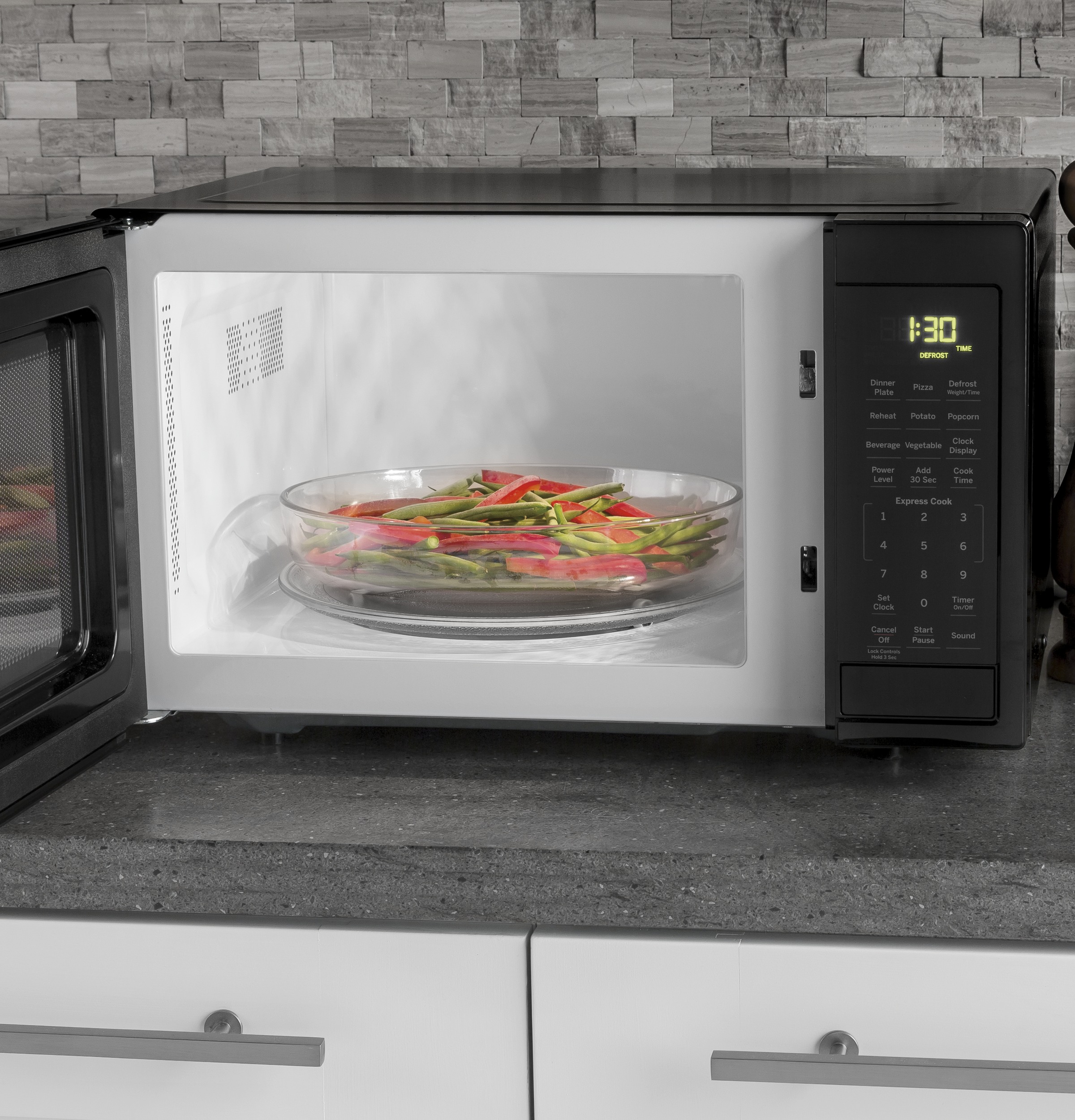 JVM1730DMBB Black - GE Spacemaker® Over-the-Range Microwave Oven